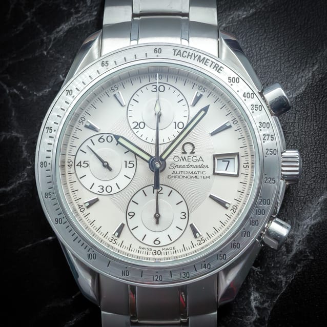 Auction: Omega Speedmaster Date Steel / Silvered 3211.30.00 | Bezel